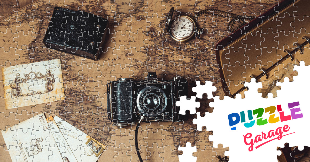 Camera on the background of the map Jigsaw Puzzle (Stuff, Foto cameras ...
