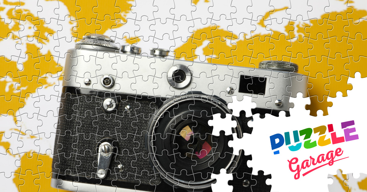 Retro camera on a yellow map Jigsaw Puzzle (Stuff, Foto cameras ...