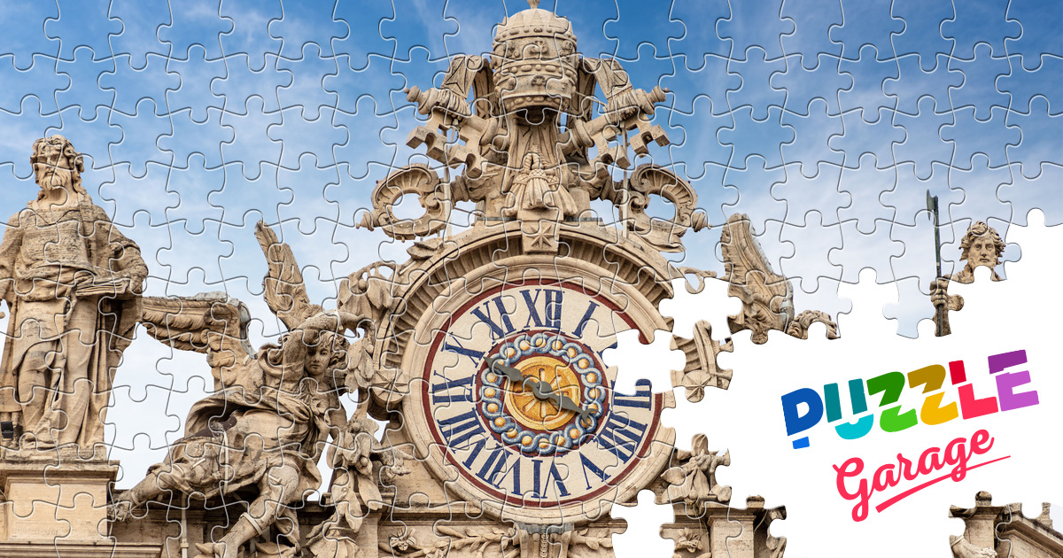 Clock and sculptures on the facade of St. Peter's Basilica in the ...