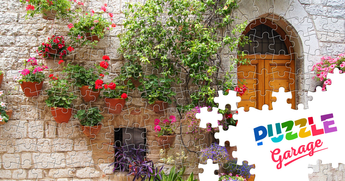 Multicolored flowers on the facade of the house Jigsaw Puzzle (Home ...