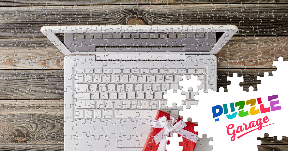 White laptop and gift Jigsaw Puzzle (Stuff, Electronics) | Puzzle Garage