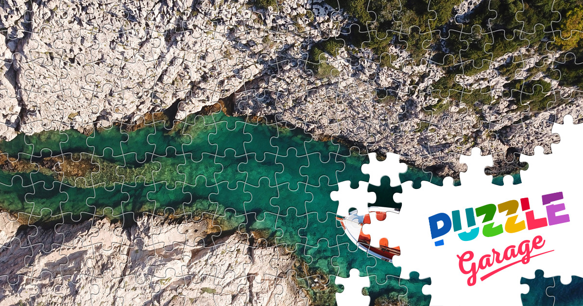 Boat in a narrow canal Jigsaw Puzzle (Other, Aerial view) | Puzzle Garage